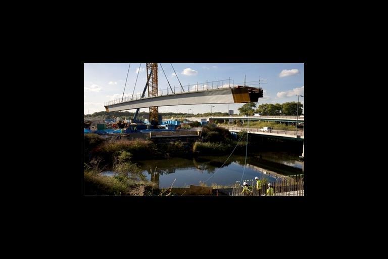 Olympic site video: First permanent bridge lifted into place | News ...